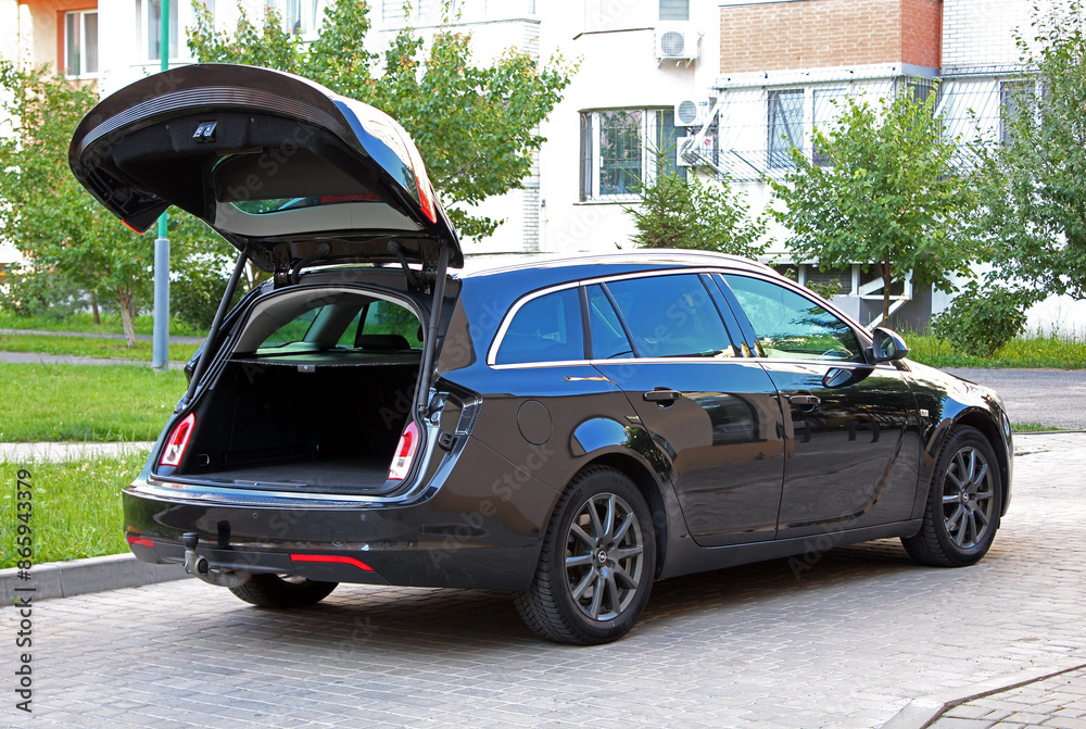 Vinnytsia, Ukraine; June 25, 2024. Black Opel Insignia open trunk ...
