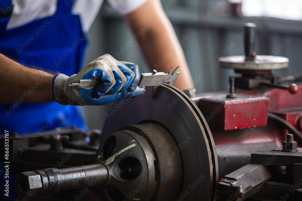 Engineering worker man wearing uniform safety working using vernier ...