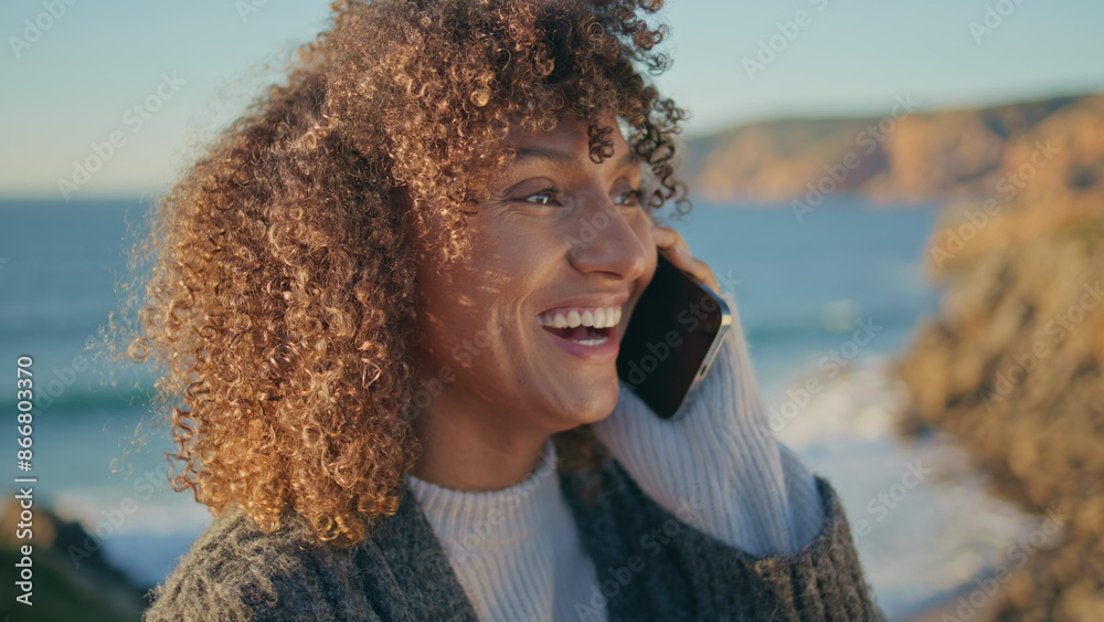 Laughing model smartphone call at sea background closeup. Excited woman ...