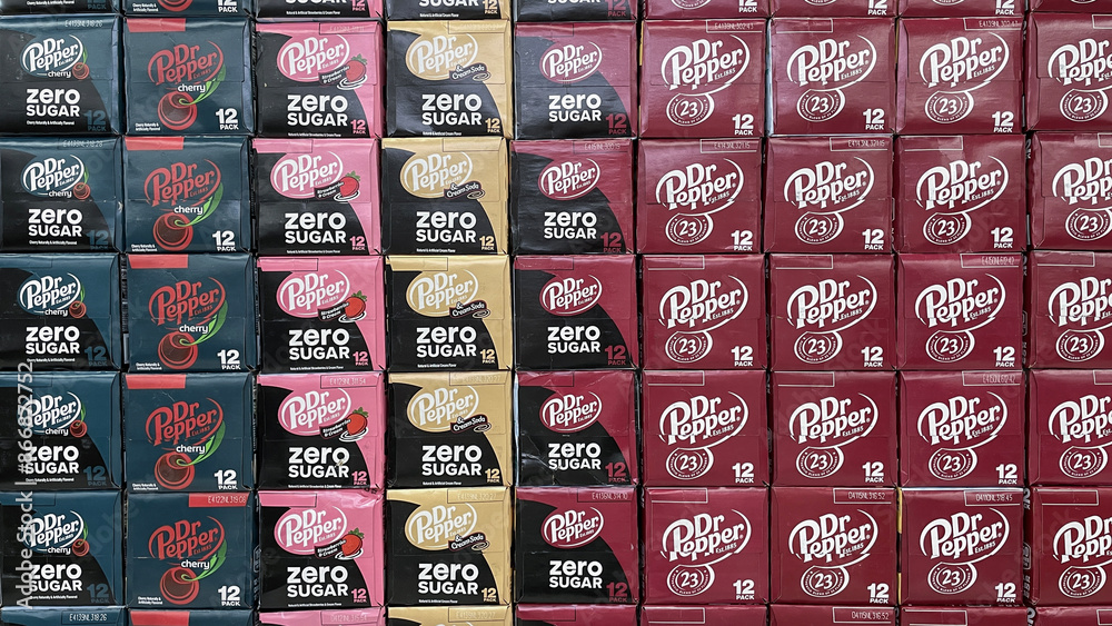 Dr Pepper soft drink cases on display at a grocery store. Dr Pepper is ...