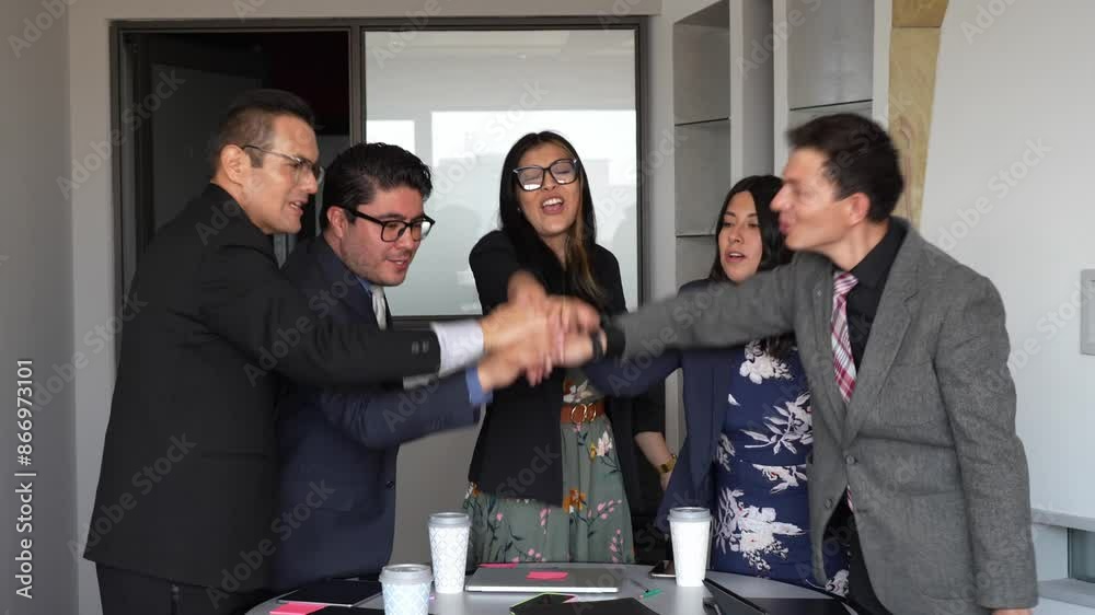 business people stack hands pile and cheer up together, good work ...