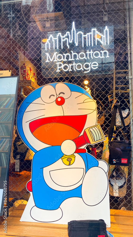 DORAEMON on the window of Manhattan Portage Bag shop at Harajuku, Tokyo ...