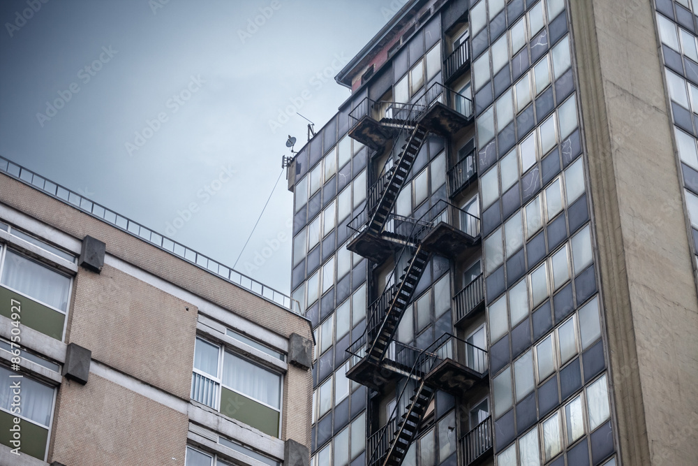 Emergency stairs on an old skyscraper building in North America depict ...