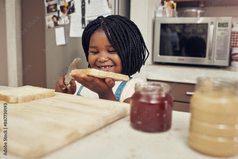 Black child, food and smile for sandwich in kitchen with knife, wood ...