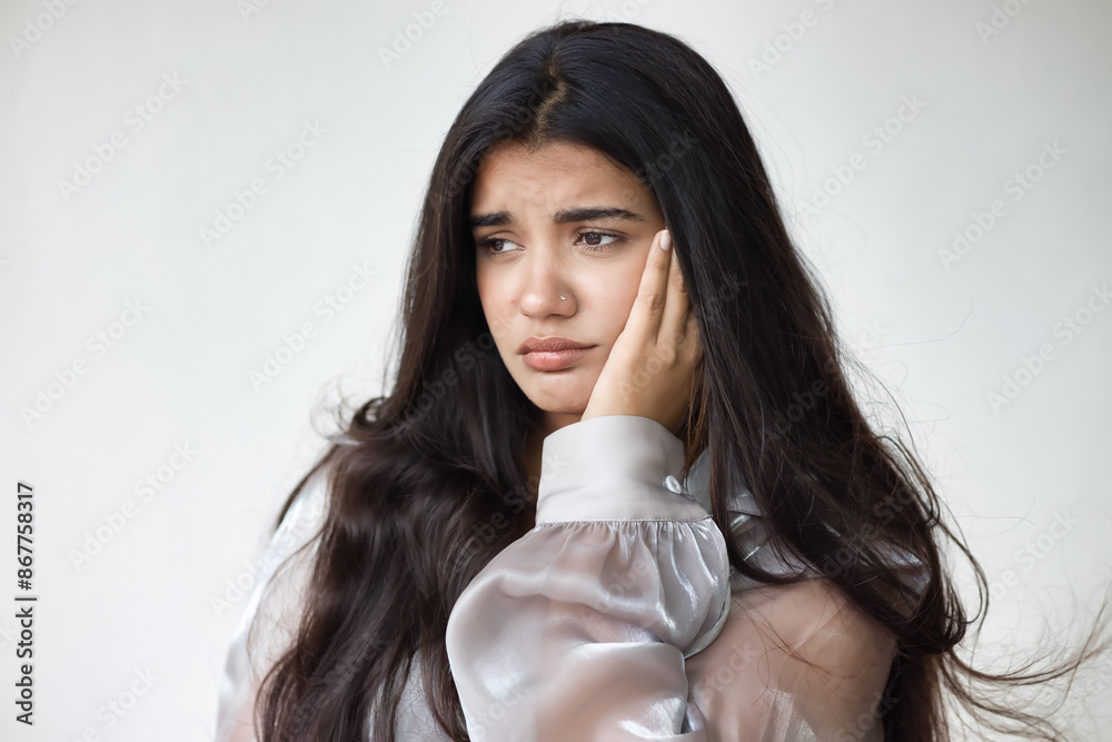 South Asian, Indian woman suffering from toothache, tooth decay, tooth ...