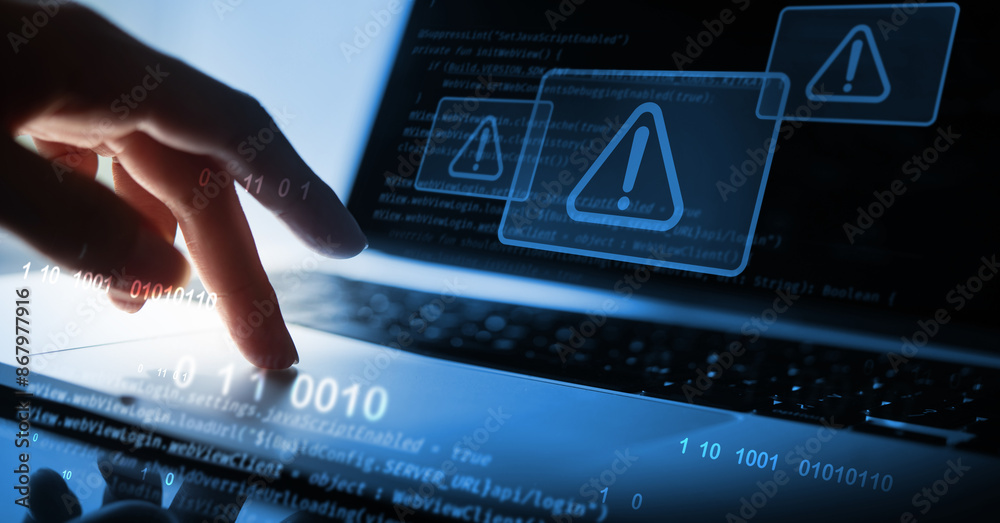 Cyber security concept. Man using computer with system hacked alert due ...