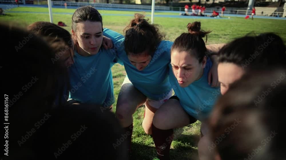 Female Rugby Team Huddling for Motivation. Determined female rugby ...