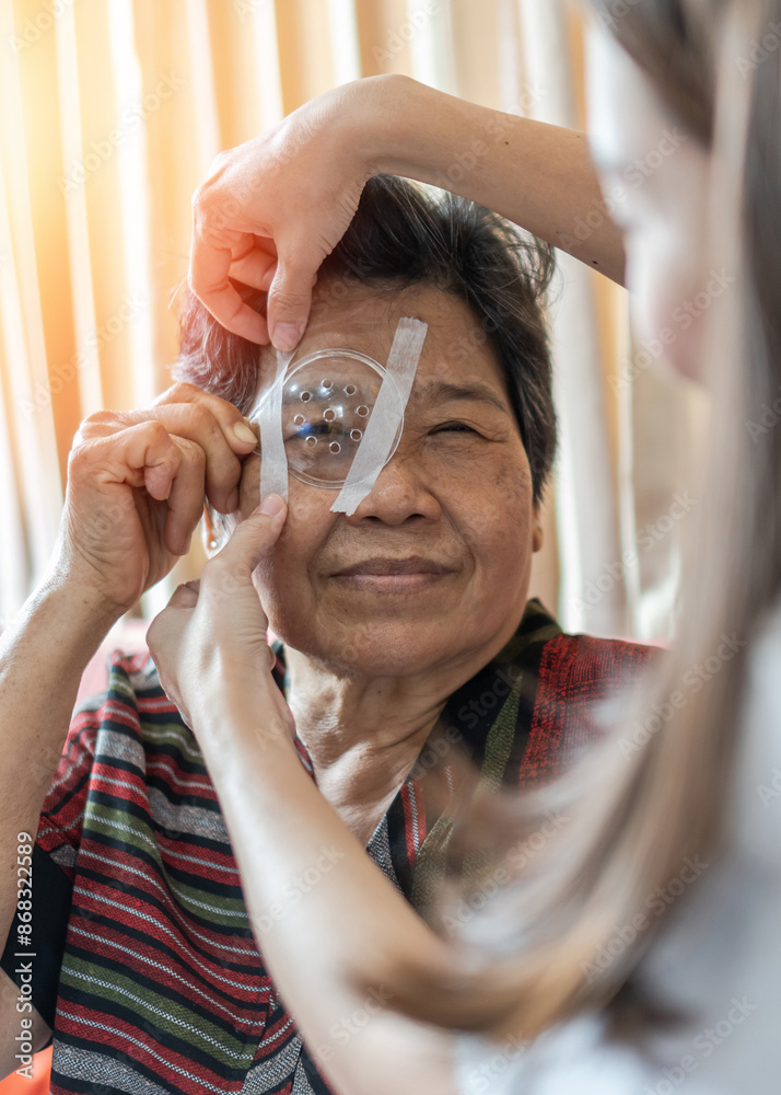 Cataract elderly patient, Asian old senior woman having eye care ...