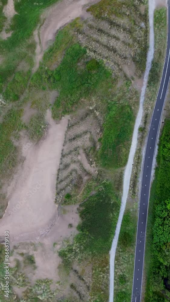 A beautiful bike path shot from above. Flying a quadcopter over a bike ...