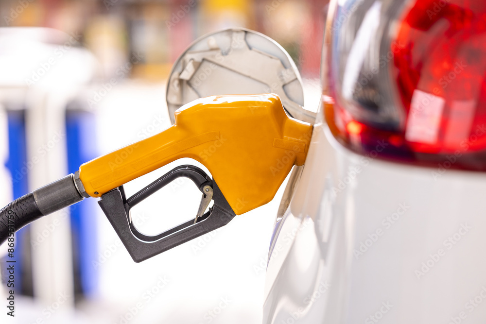 Refill and filling Oil Gas Fuel at station. Gas station - refueling. To ...