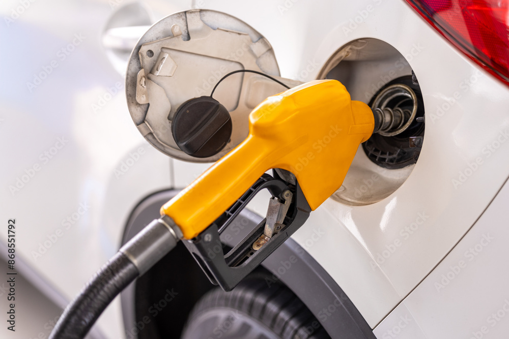 Refill and filling Oil Gas Fuel at station. Gas station - refueling. To ...