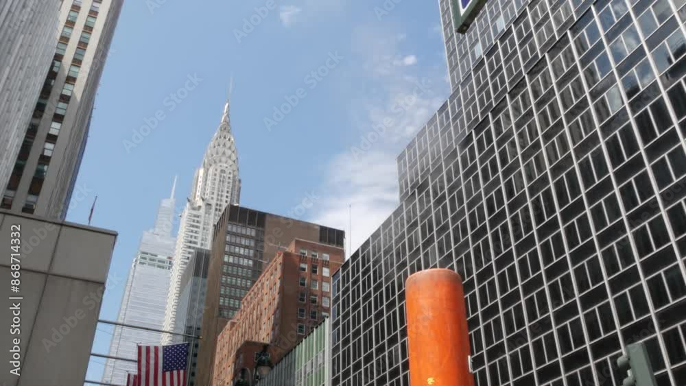 Steam vapor vented, New York City 42 street, orange vapour tube stack ...