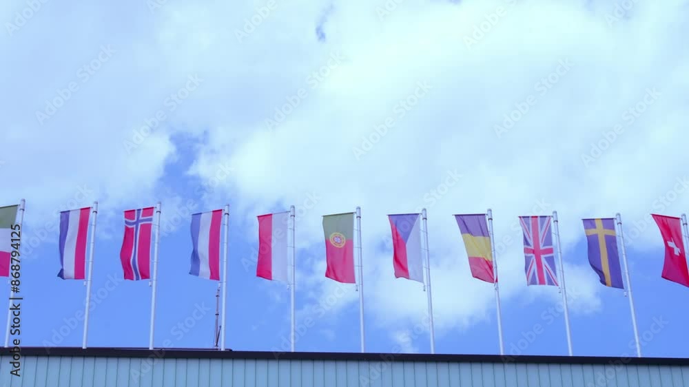 national flags Europe and other countries on satin flutter in wind in ...