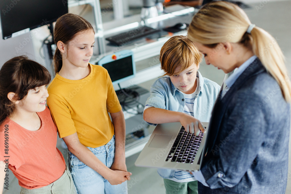 Children learning robotics in Elementary school. Young students ...