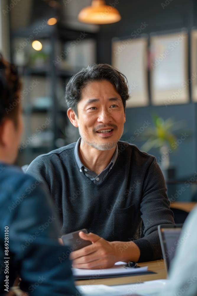 Portrait half-body of a Japanese entrepreneur discussing a product ...