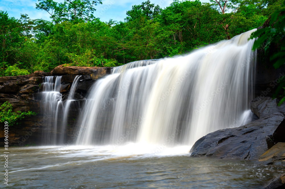 Beautiful waterfall, violent stream in the deep forest of the border of ...