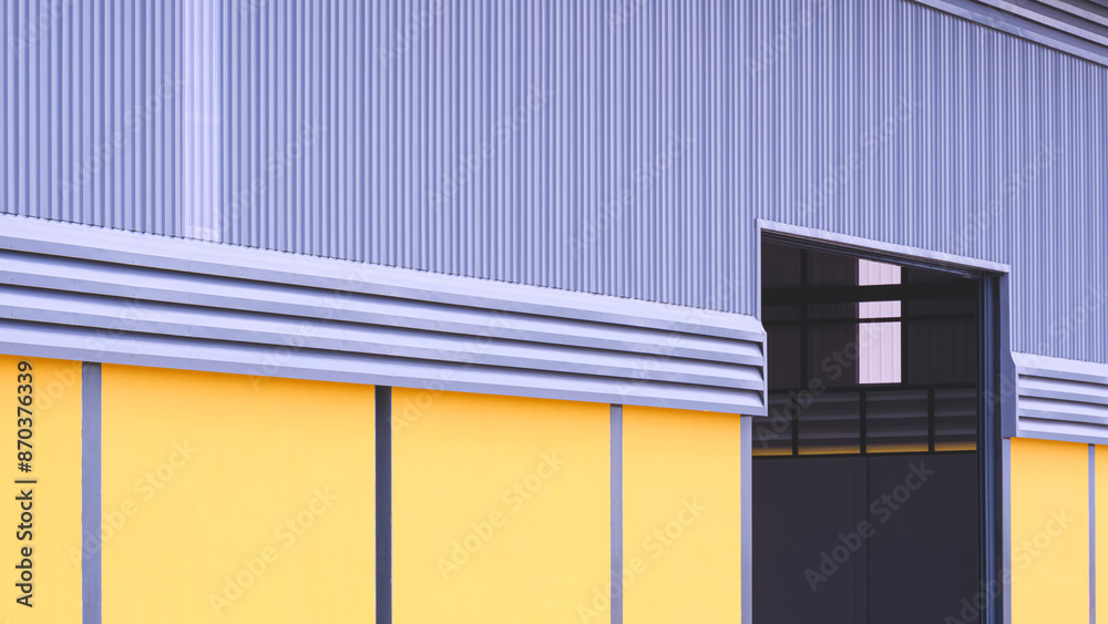 Entrance door of industrial factory building with yellow concrete and ...