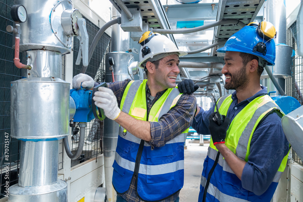 Engineer under checking the industry chilled water fan coil unit air ...