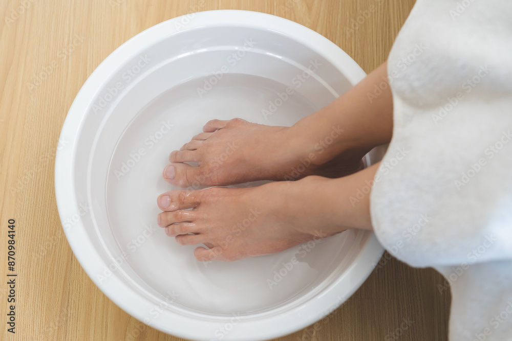 Foot bath concept, beauty asian young woman soaking hygiene feet in ...
