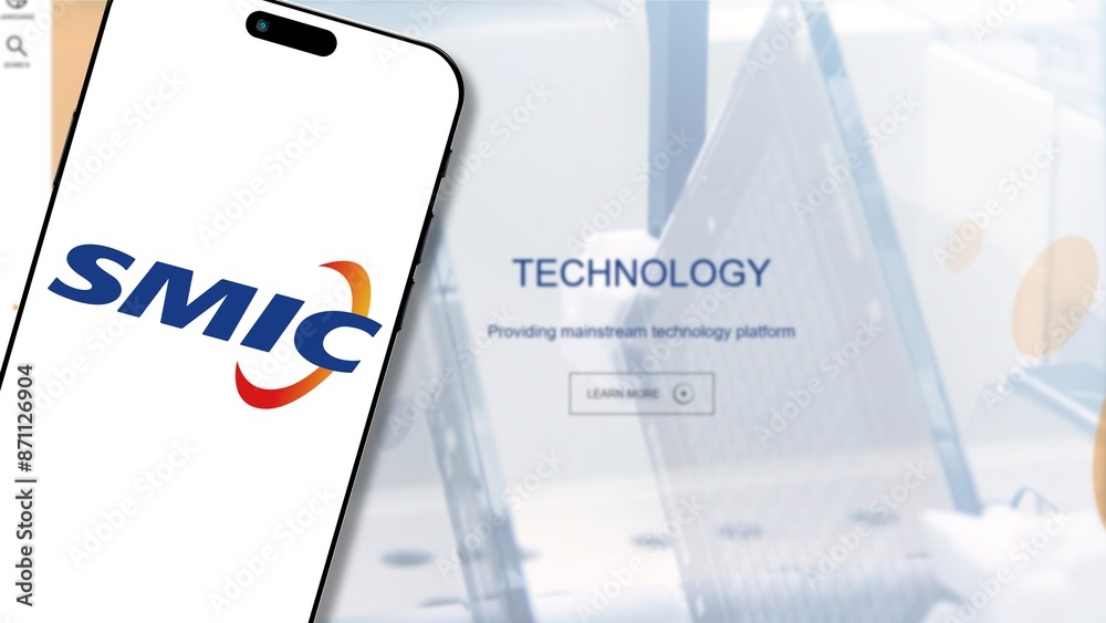 SMIC logo on a smartphone screen with website in background. SMIC, Semiconductor Manufacturing ...