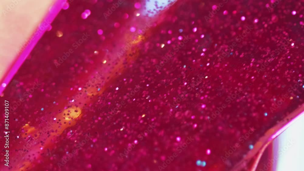 Glittering drip. Liquid sparkles. Crimson glowing pink color motion ...