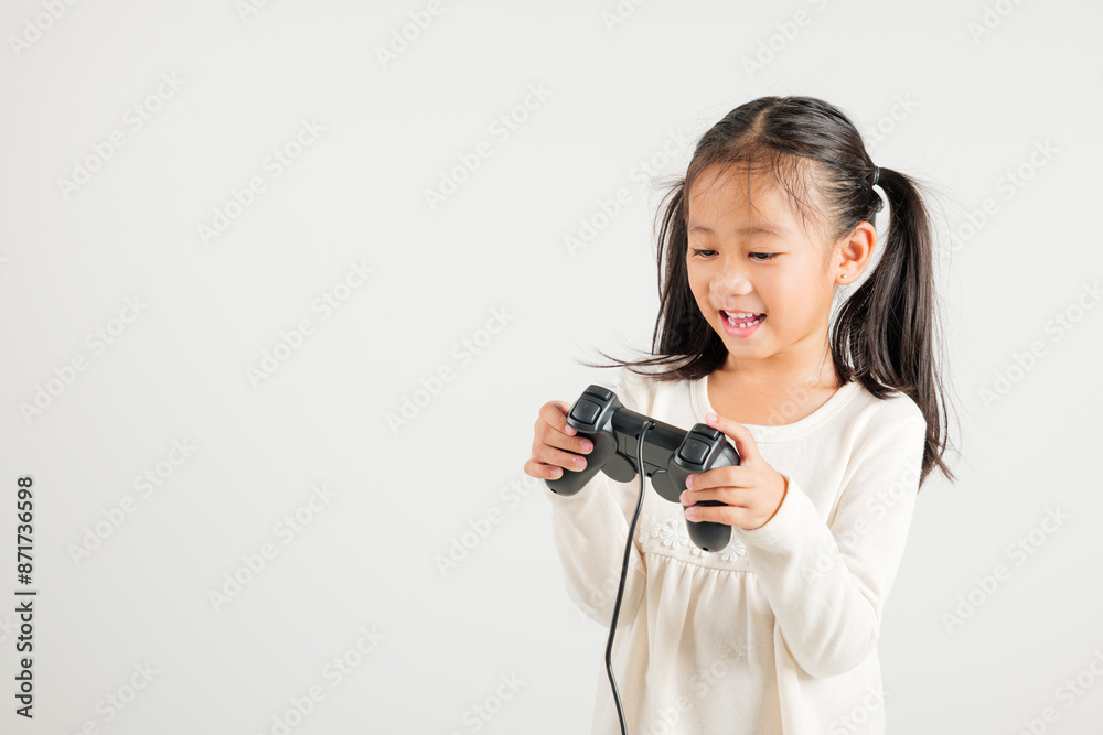 Asian happy portrait young kid girl smile lifestyle games technology ...