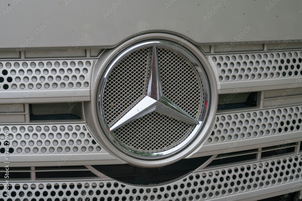 The emblem, located on the bonnet of the cars, represents a three ...