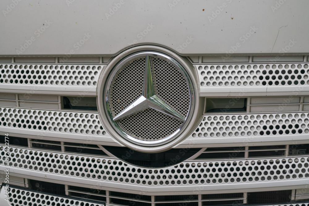 The emblem, located on the bonnet of the cars, represents a three ...