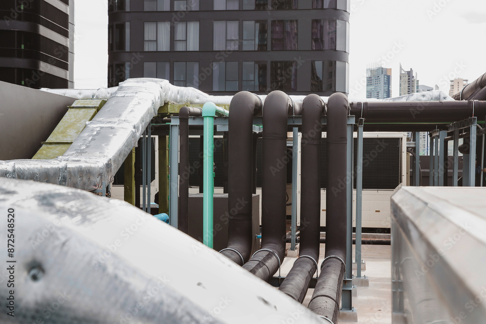 Pipe of air conditioner system on roof. a lot of pipe for air ...