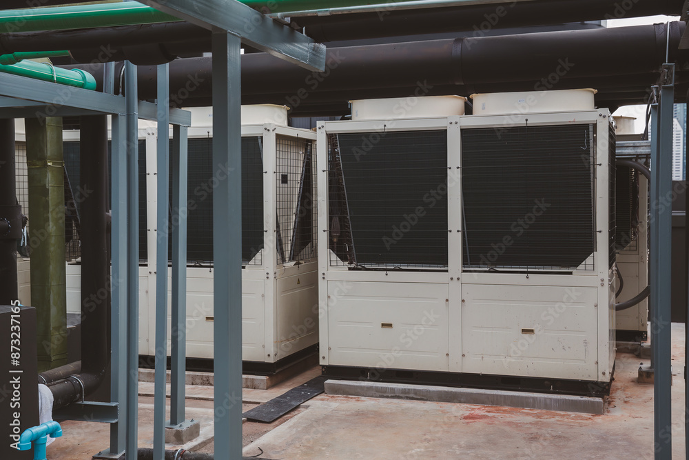 Air conditioner compressor installed in old building. Outdoor split ...