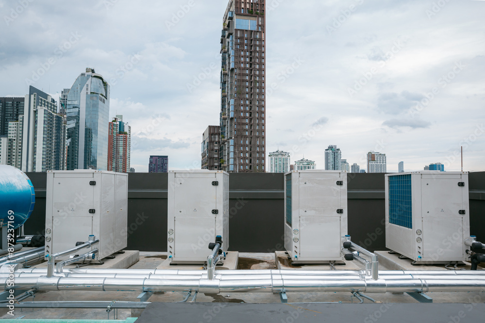 Air conditioner compressor installed in old building. Outdoor split ...