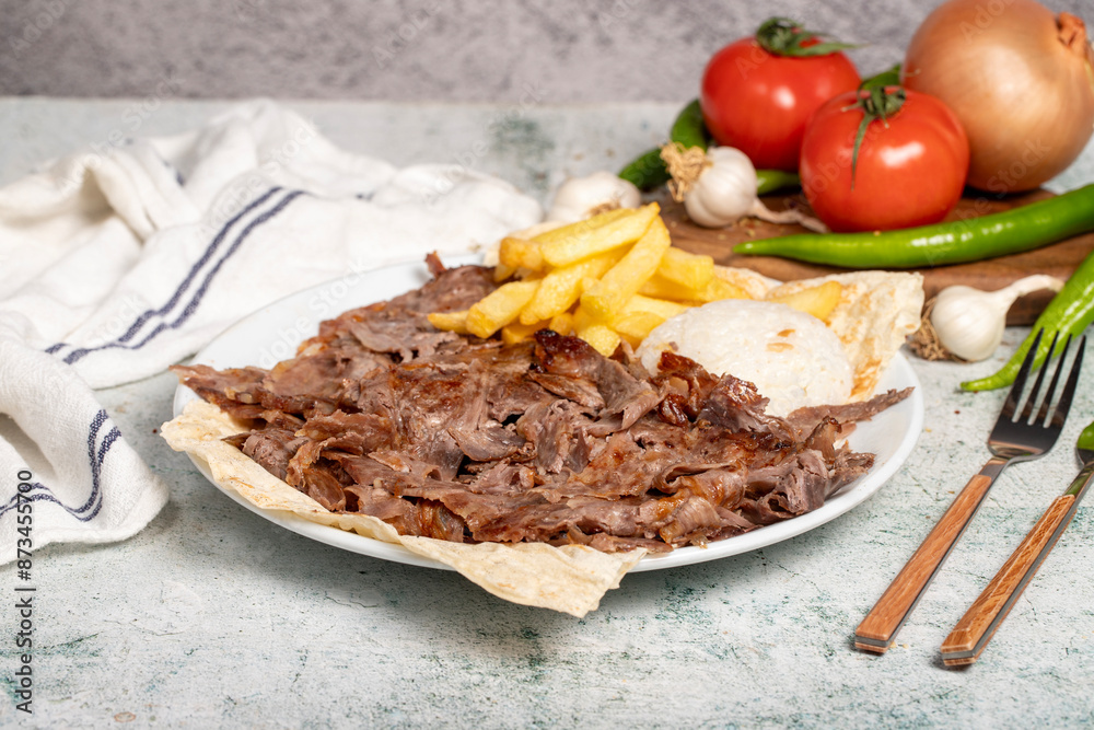 Meat doner with rice and French fries. Traditional Turkish cuisine ...