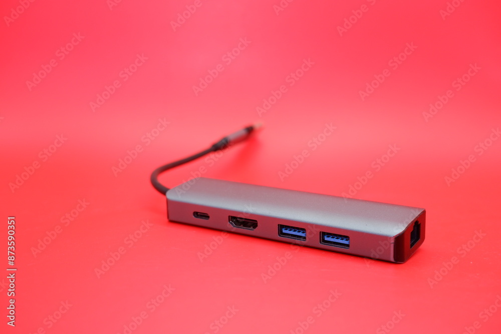 Portable USB hub consisting of USB A port, HDMI port and USB C port ...