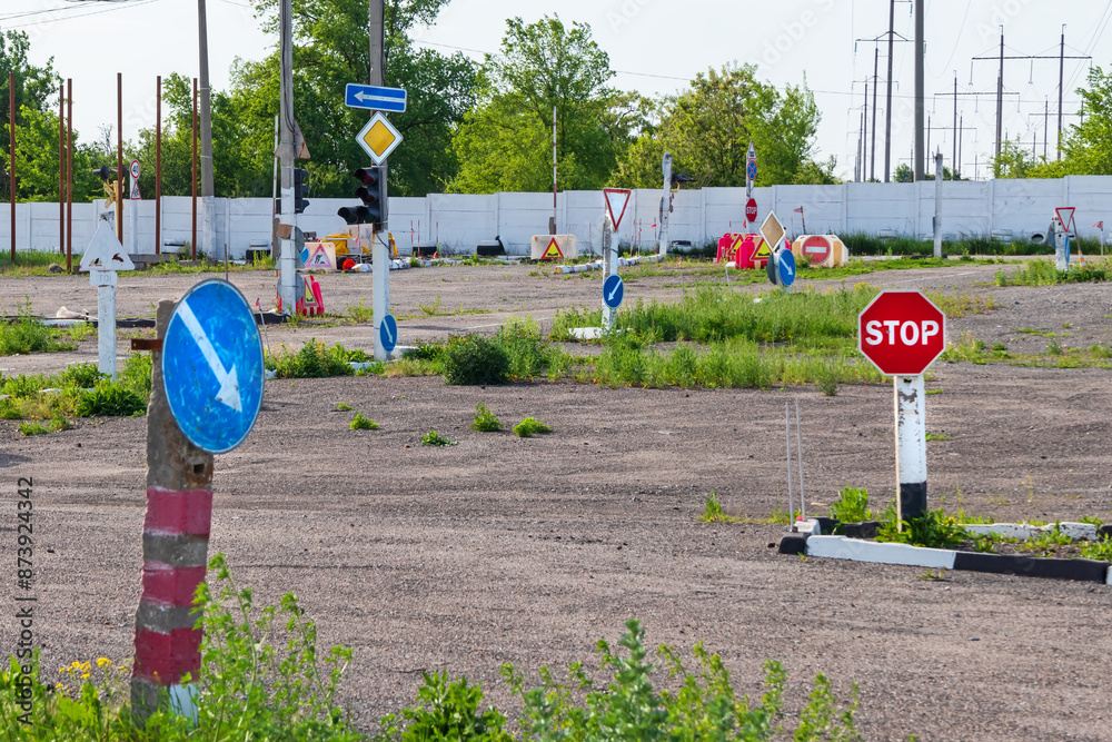 Foto de Training area with road signs for teaching traffic rules and ...