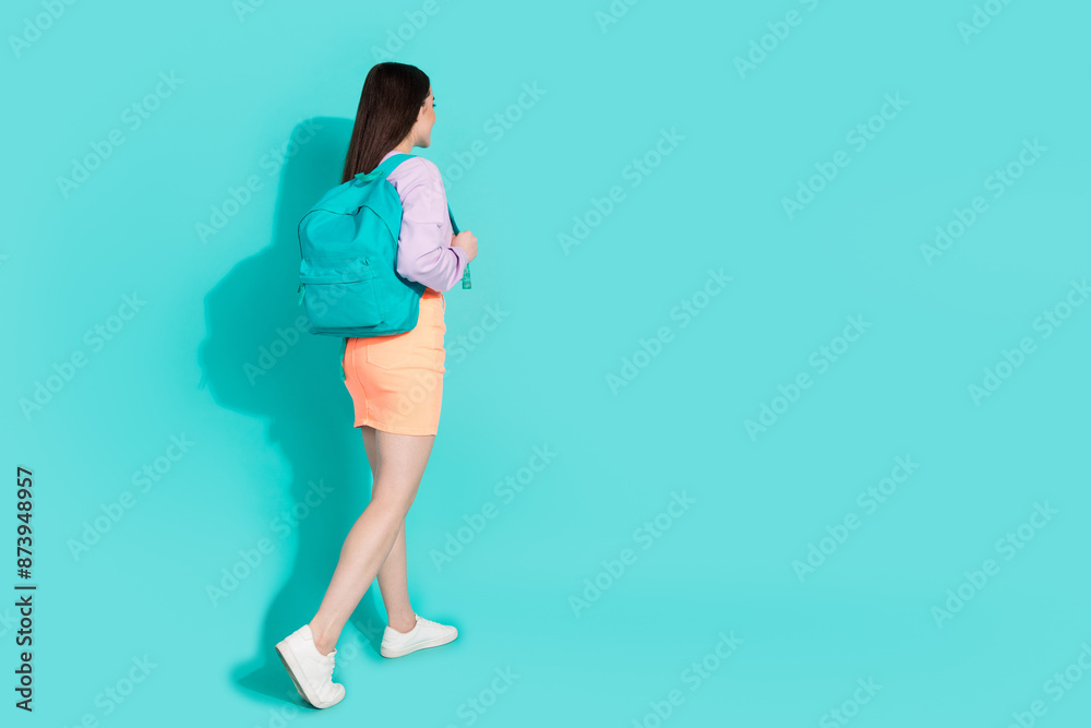 Full body photo of pretty young girl walk back view backpack wear ...