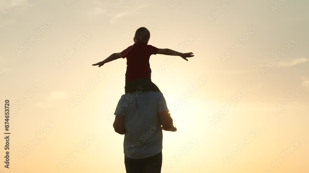 silhouette father carrying child boy his shoulders sunsethappy family ...