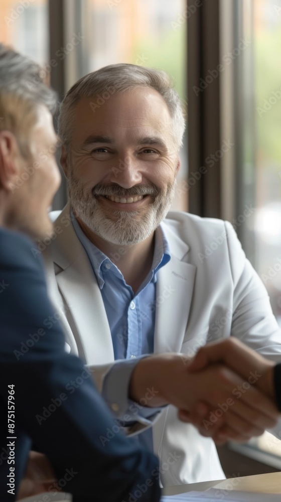 Smiling Middle-Aged Businessman and HR Manager Shaking Hands with New ...
