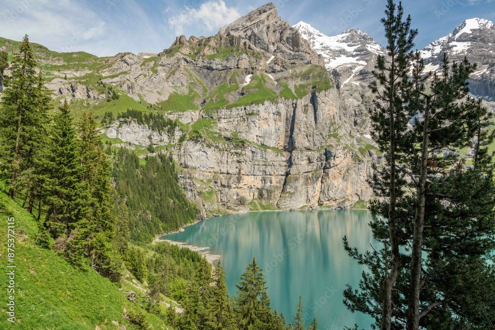 Summer view from high up in the mountains on the Oeschinensee lake in ...