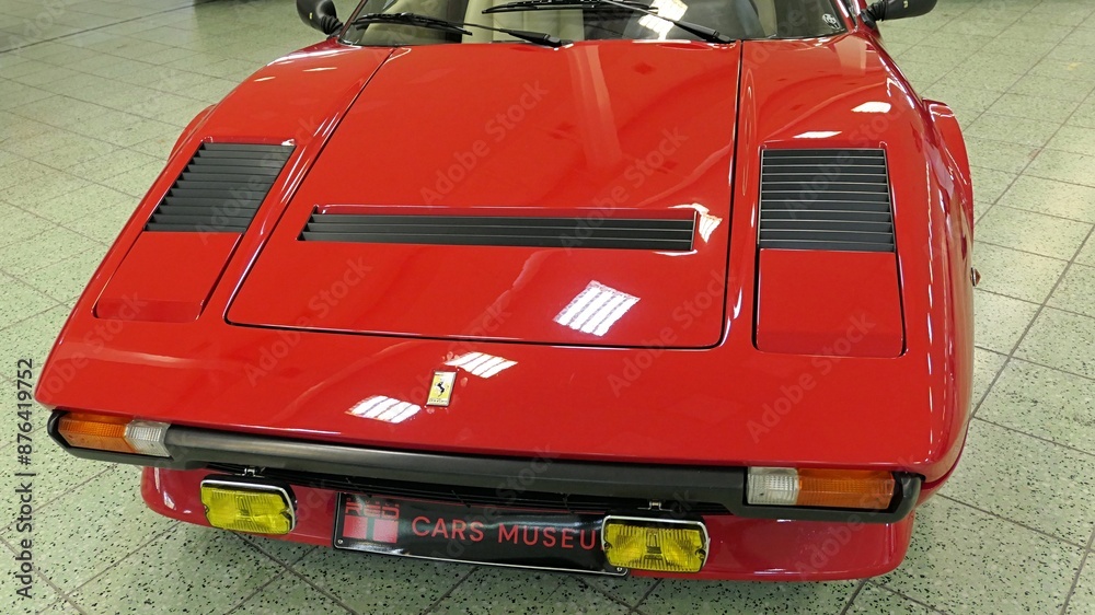 Sleek aerodynamic front mask of classic V8 mid-engined two seater ...