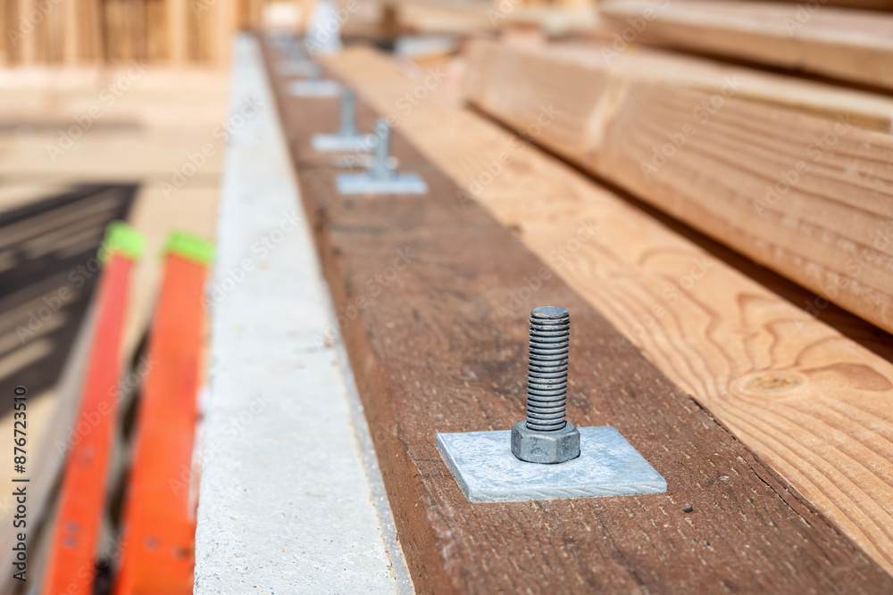 New home construction detail, ladder leaning against cement foundation ...