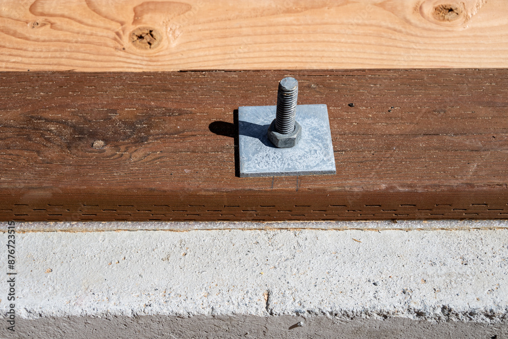 New home construction detail, with wood sill plate and anchor bolts ...