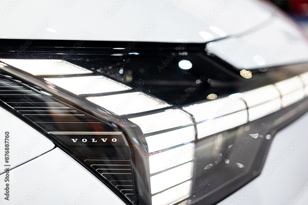 Close up VOLVO logo on Headlight of Volvo EX30 electric SUV produced ...