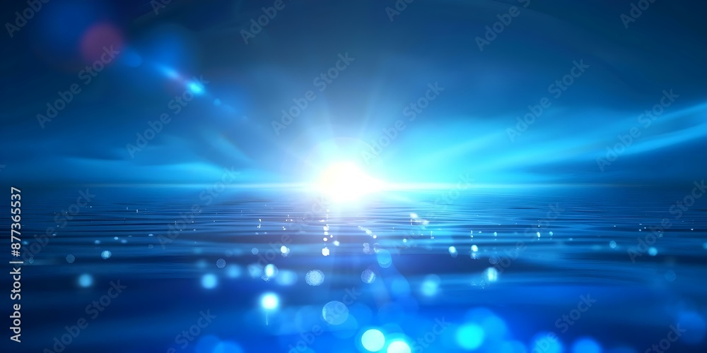 Soft focus blue background with lens flares and dreamy light effects ...