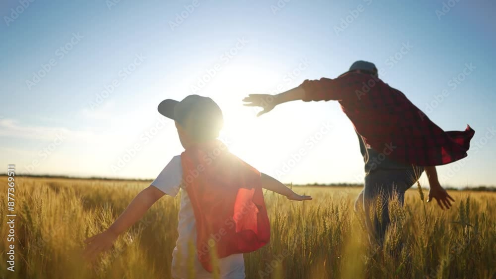 Father and son running with superhero. Family kid happy concept. A ...