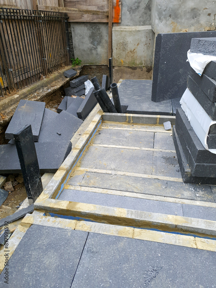 Beam and block floor construction with insulation boards and thermal ...