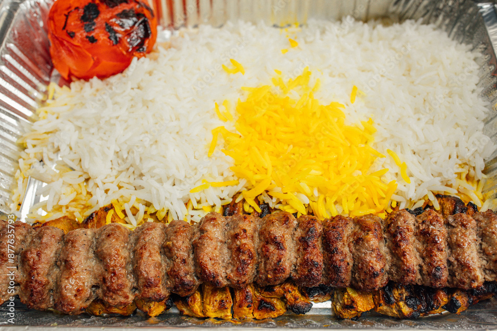 takeout platter of Persian food: basmati rice sprinkled with saffron ...