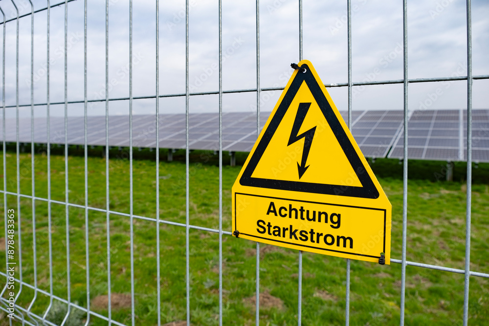 yellow warning sign Solar farms, capturing solar energy through ...
