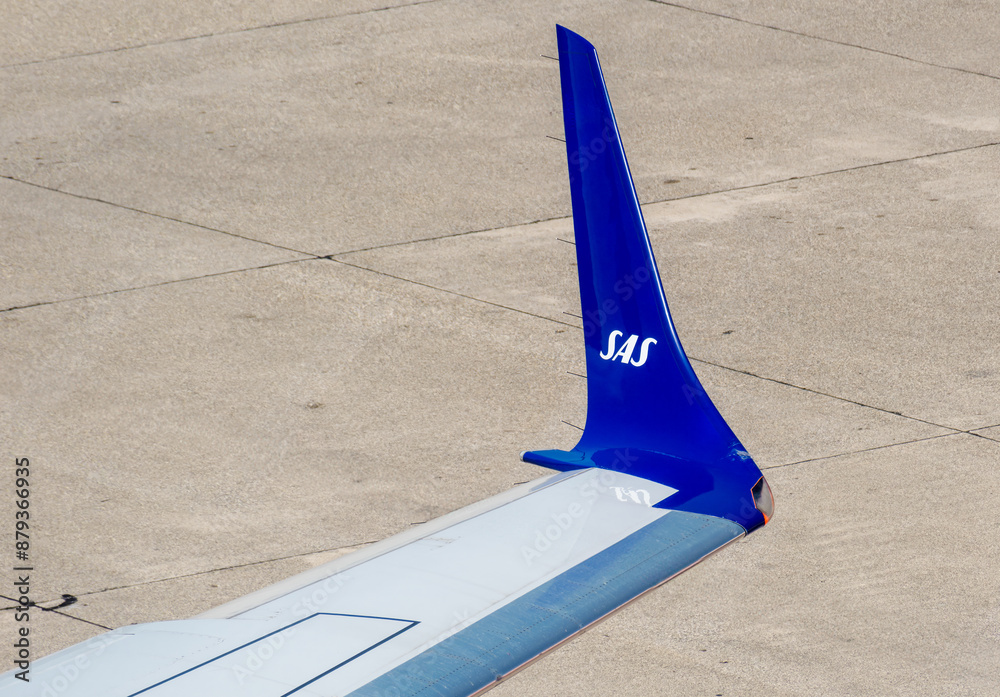 Geneva, Switzerland - July 04, 2024: sign and logo on the wingtip of an ...