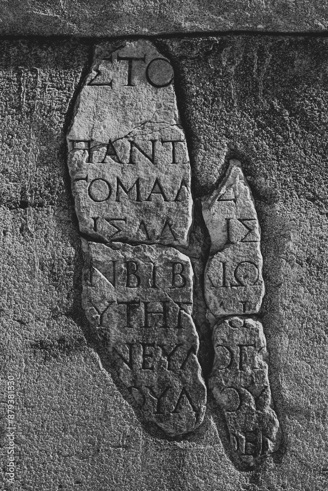 Celsus Library in ancient city Ephesus. Ancient greek inscriptions on ...