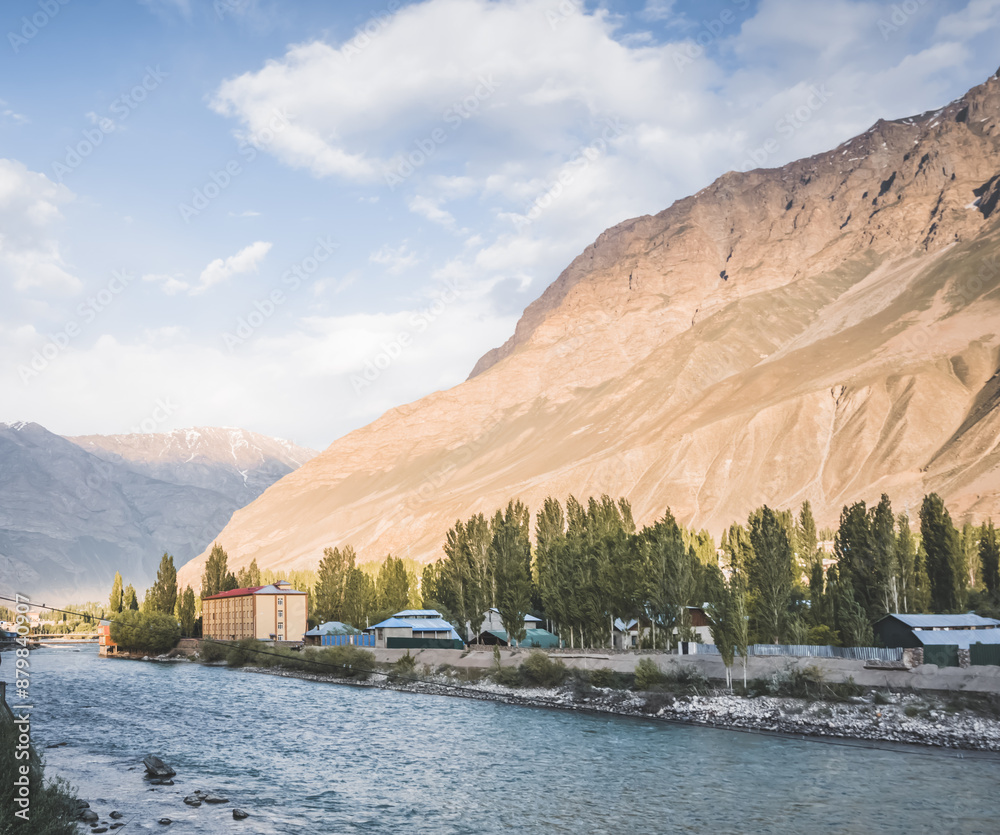 Panorama of the city of Khorog in Tajikistan and the Gunt river flowing ...